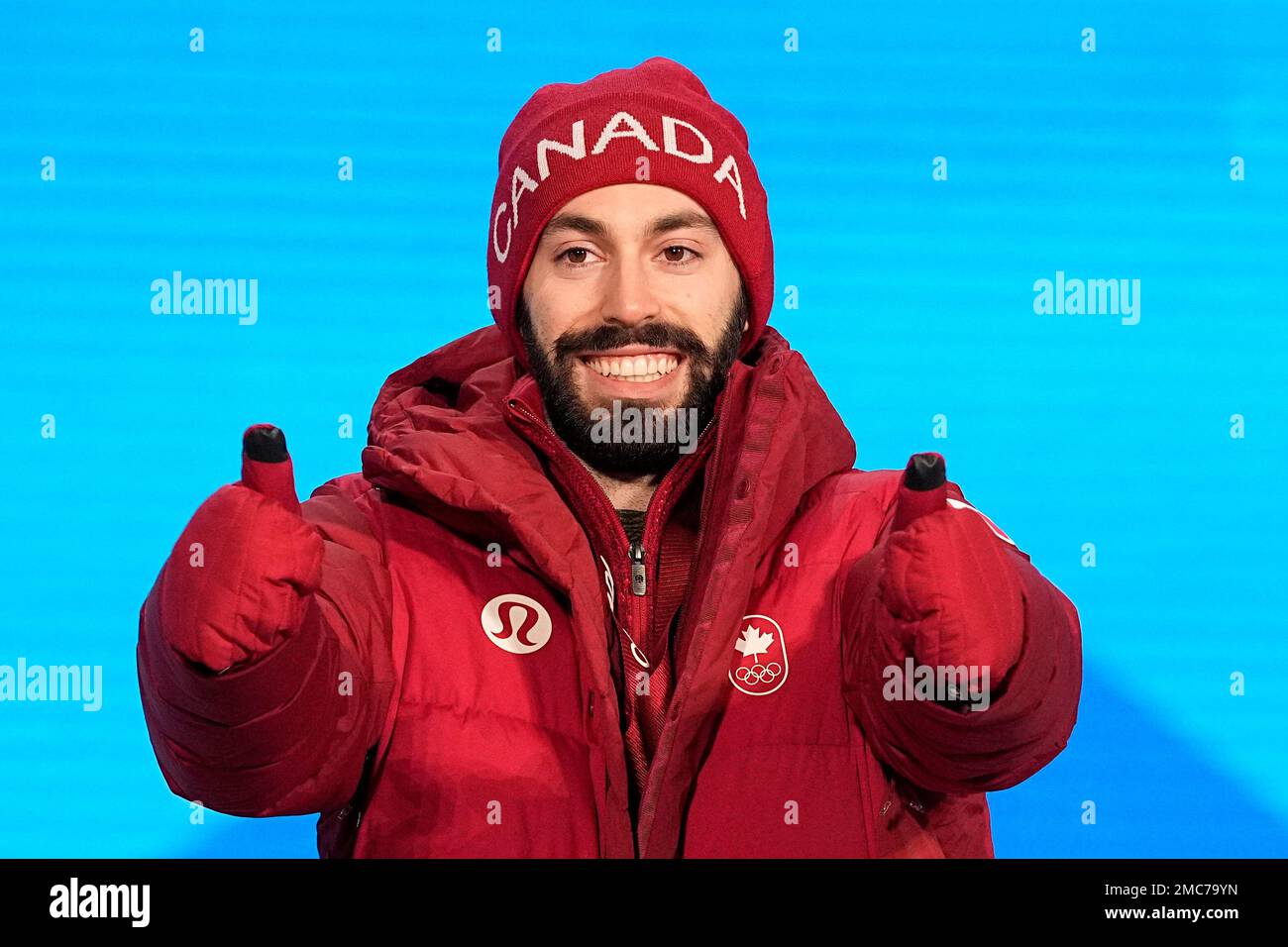 Bronze medalist Steven Dubois of Canada celebrates during the medal ...