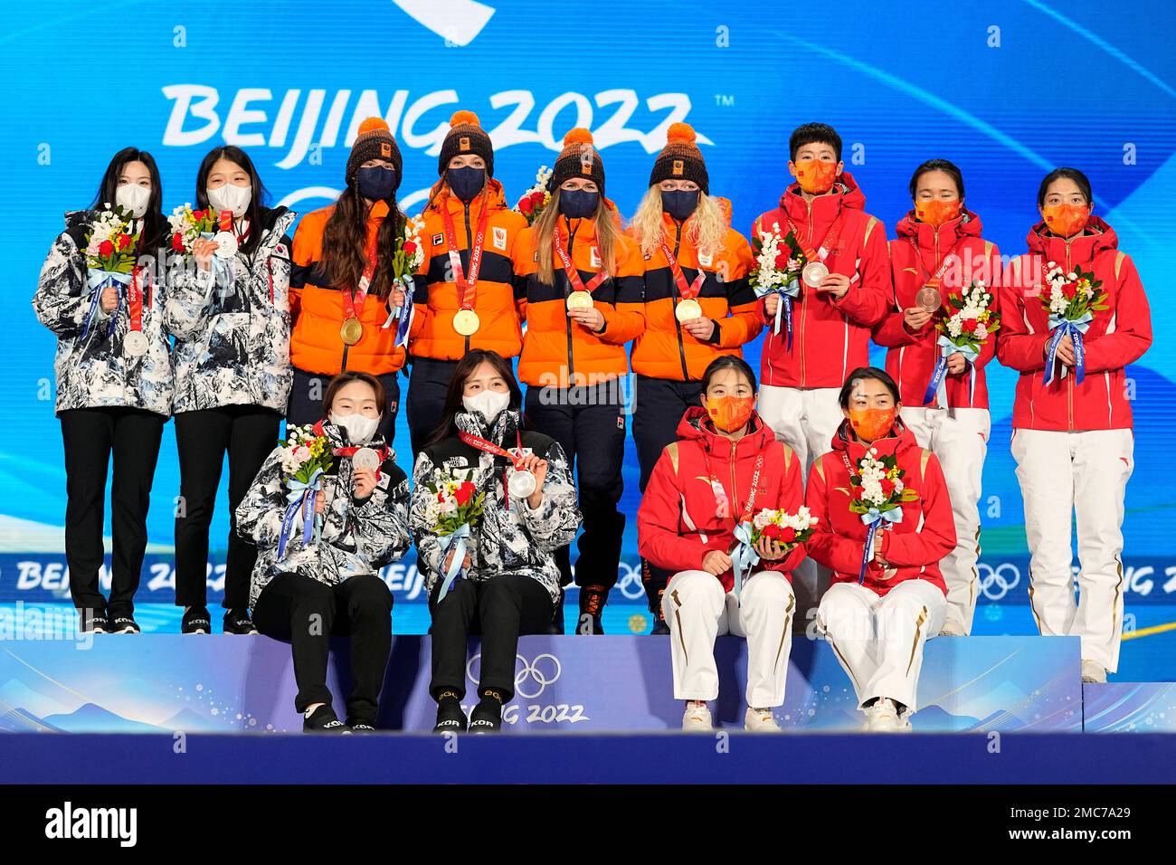 From left, silver medalists team South Korea, gold medalists team Netherlands and bronze ...