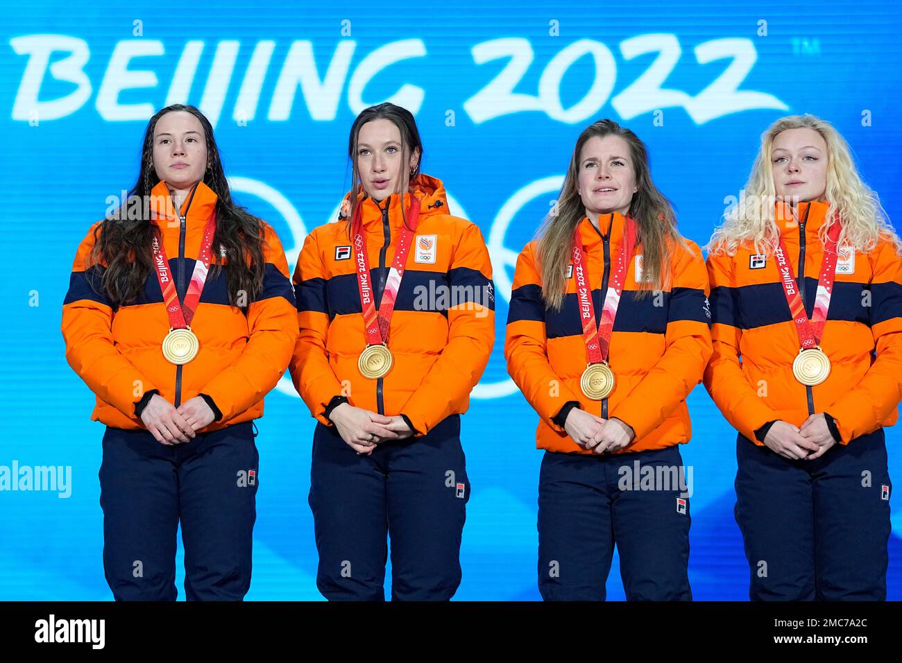 Gold medalists team Netherlands stands for their national anthem during the medal ceremony for ...