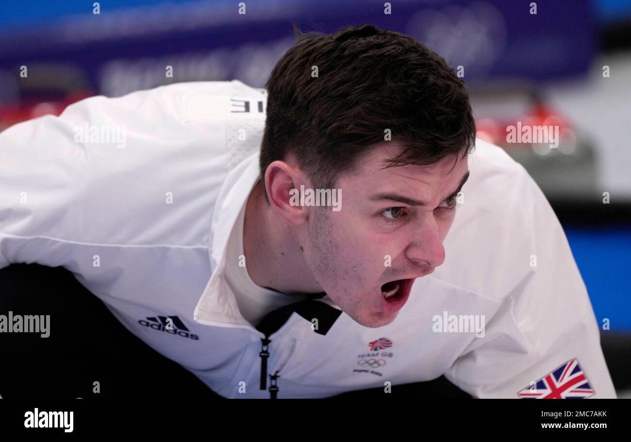 Britain's Grant Hardie, leads his teammates, during the men's curling ...