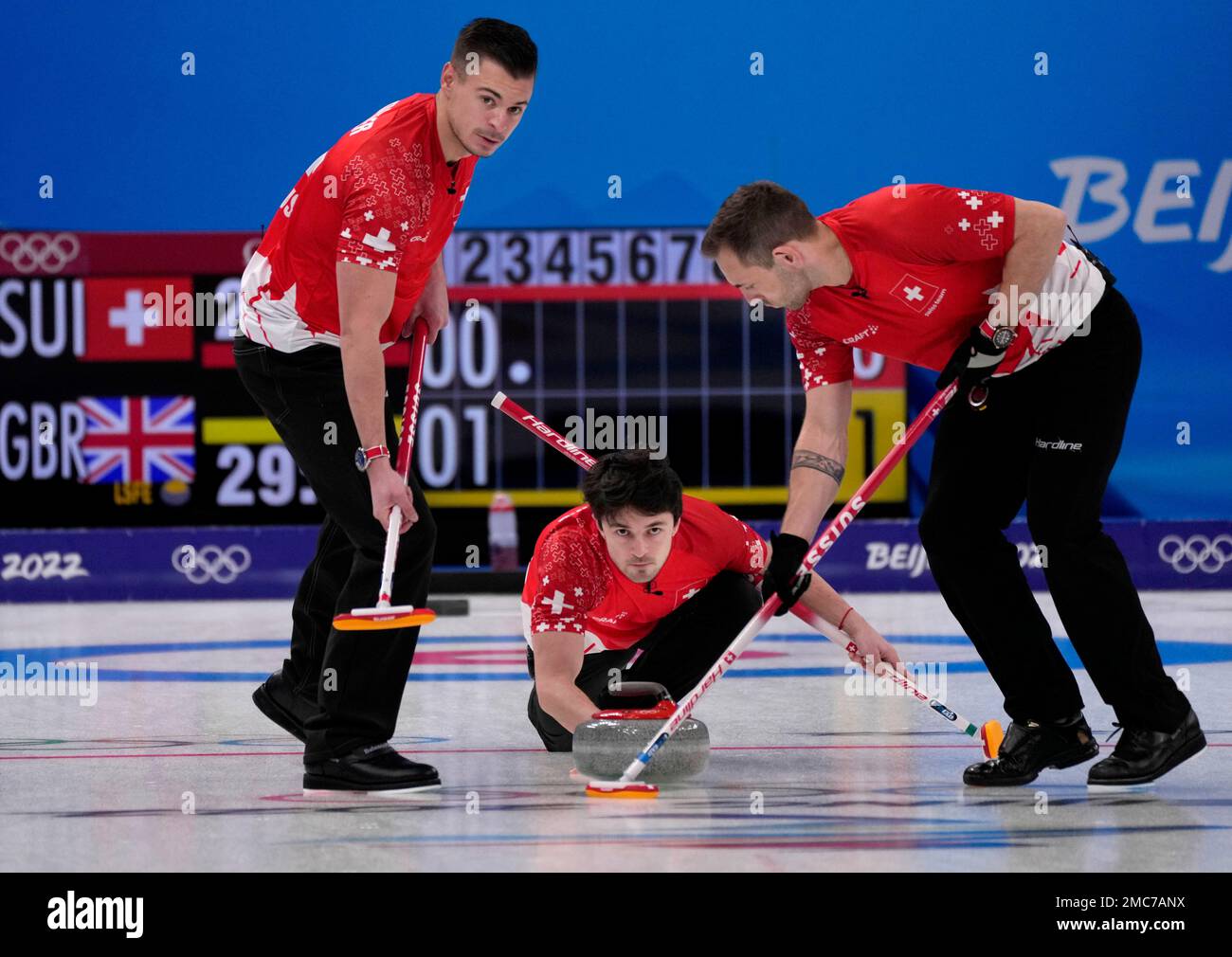 Switzerland's Benoit Schwarz, throws a rock, during the men's curling ...