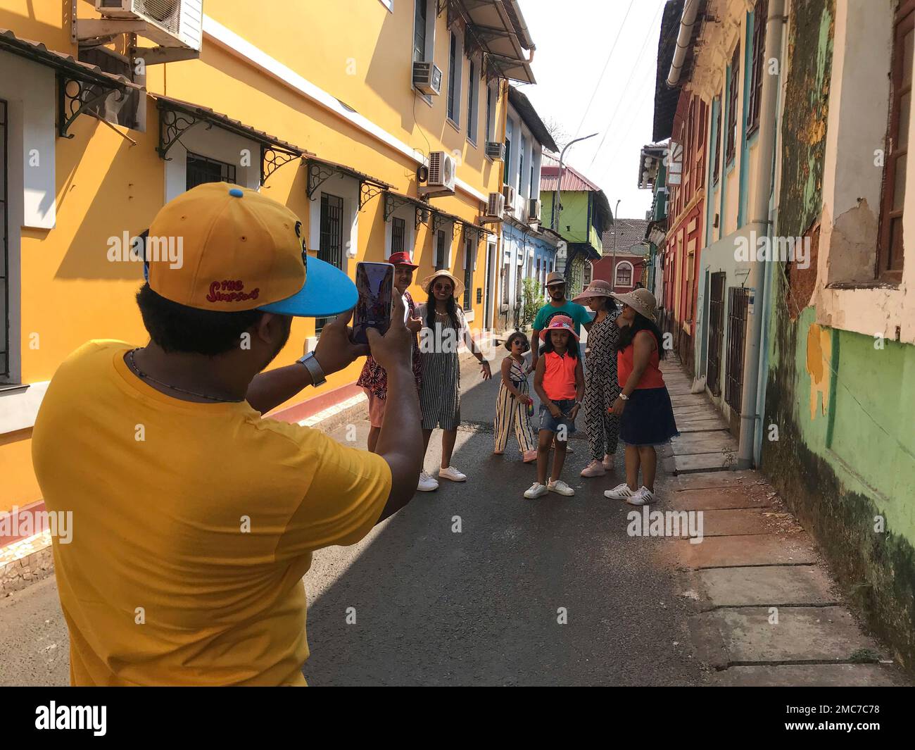 Tourists take photos at Fontainhas, a UNESCO heritage site with ...