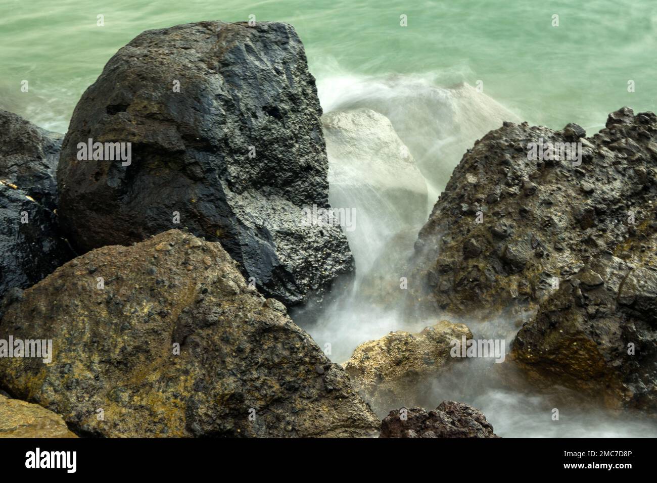 Rocks on the Marina Beach Semarang. Indonesia Stock Photo - Alamy