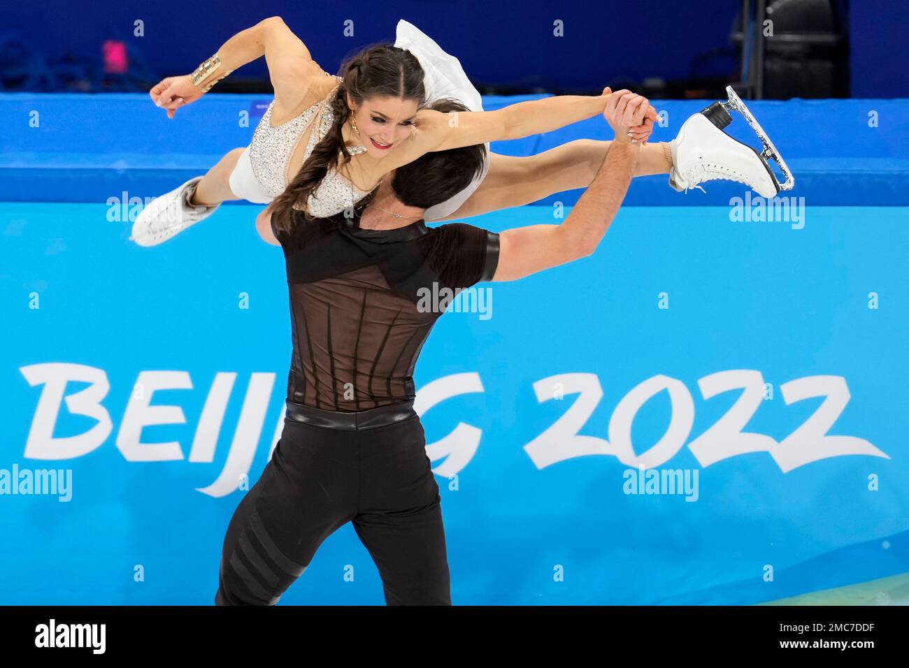 Laurence Fournier Beaudry and Nikolaj Soerensen, of Canada, perform ...