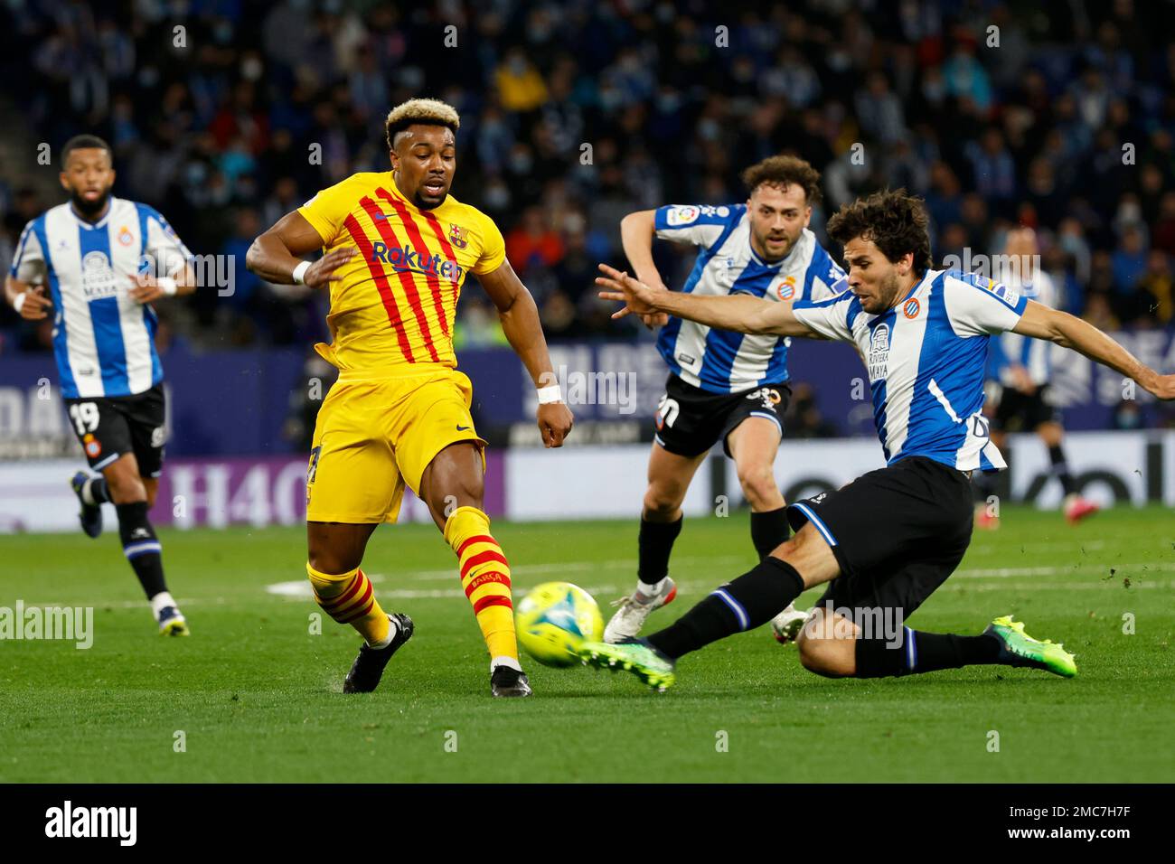 Barcelona's Adama Traore vies for the ball with Espanyol's Leandro ...