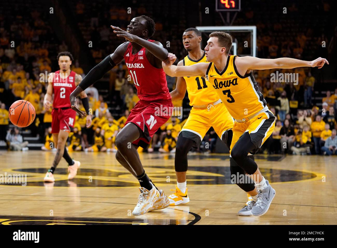 Nebraska forward Lat Mayen (11) loses control of the ball as he drives ...