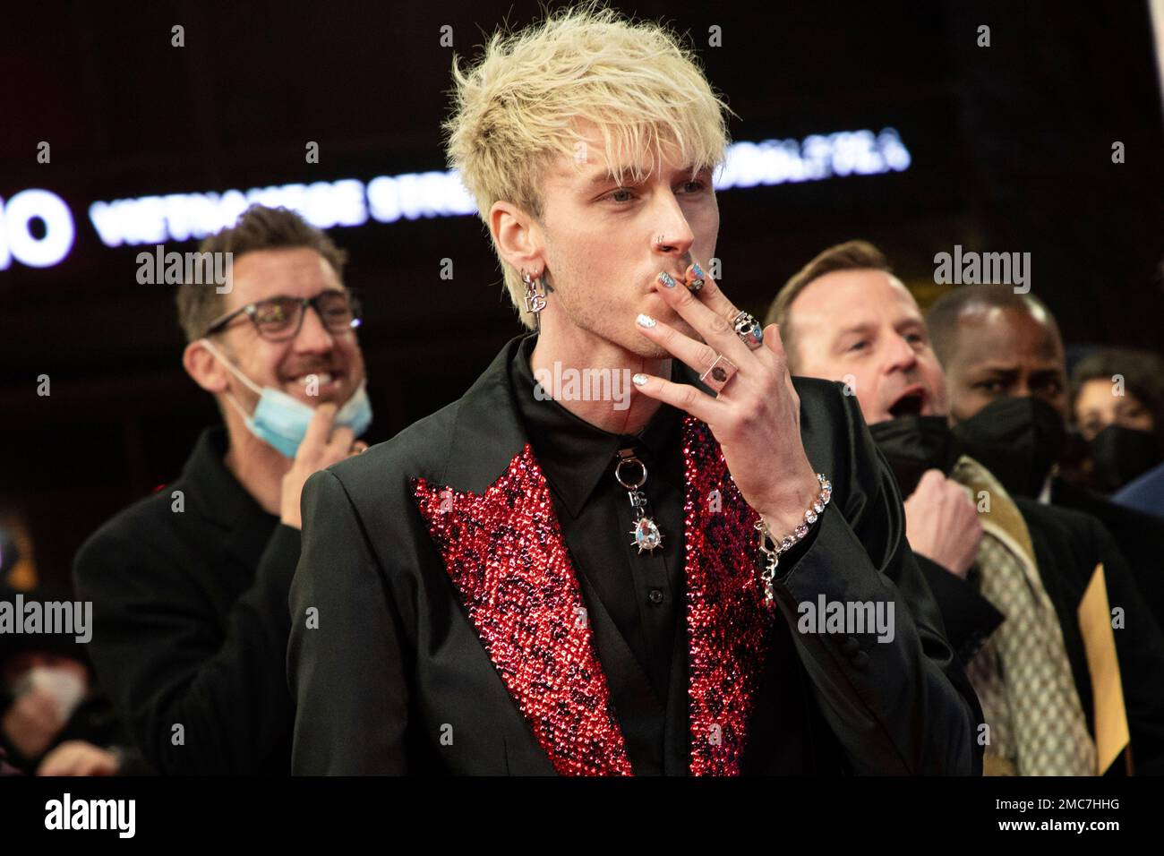 Colson Baker, also known as Machine Gun Kelly, poses for photographers ...