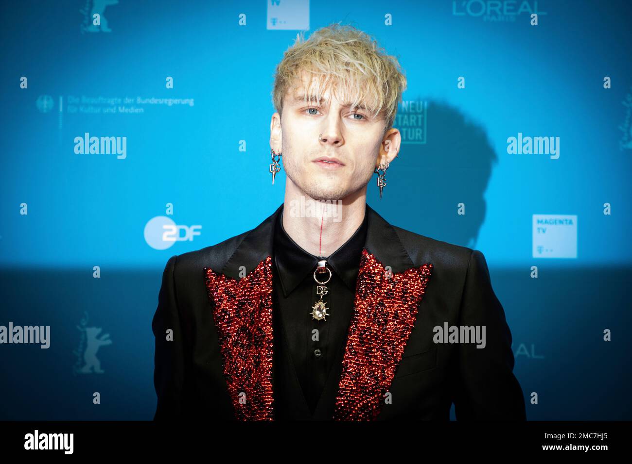 Colson Baker, also known as Machine Gun Kelly, poses for photographers ...