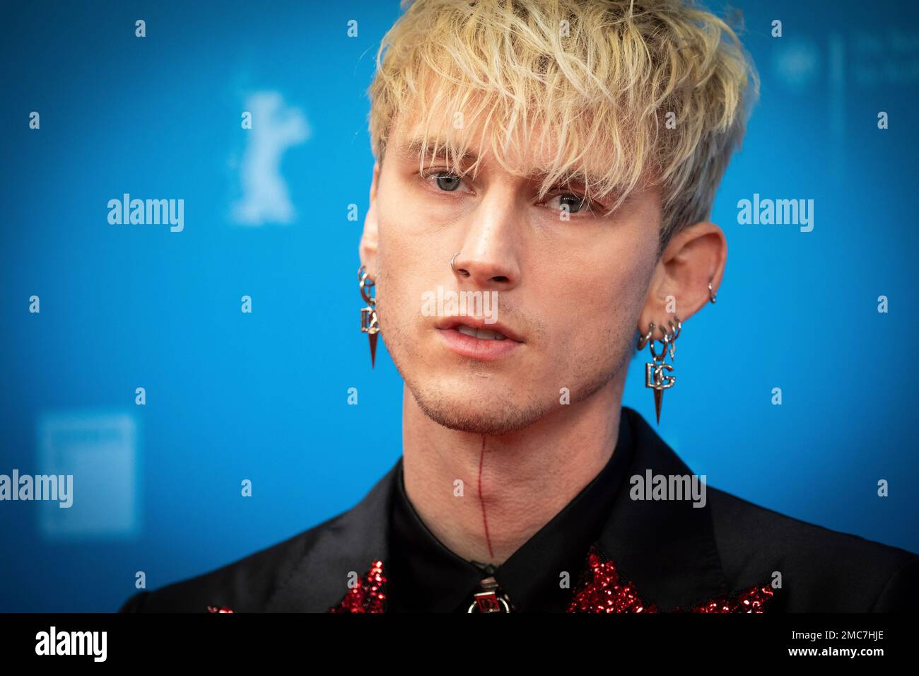 Colson Baker, also known as Machine Gun Kelly, poses for photographers ...