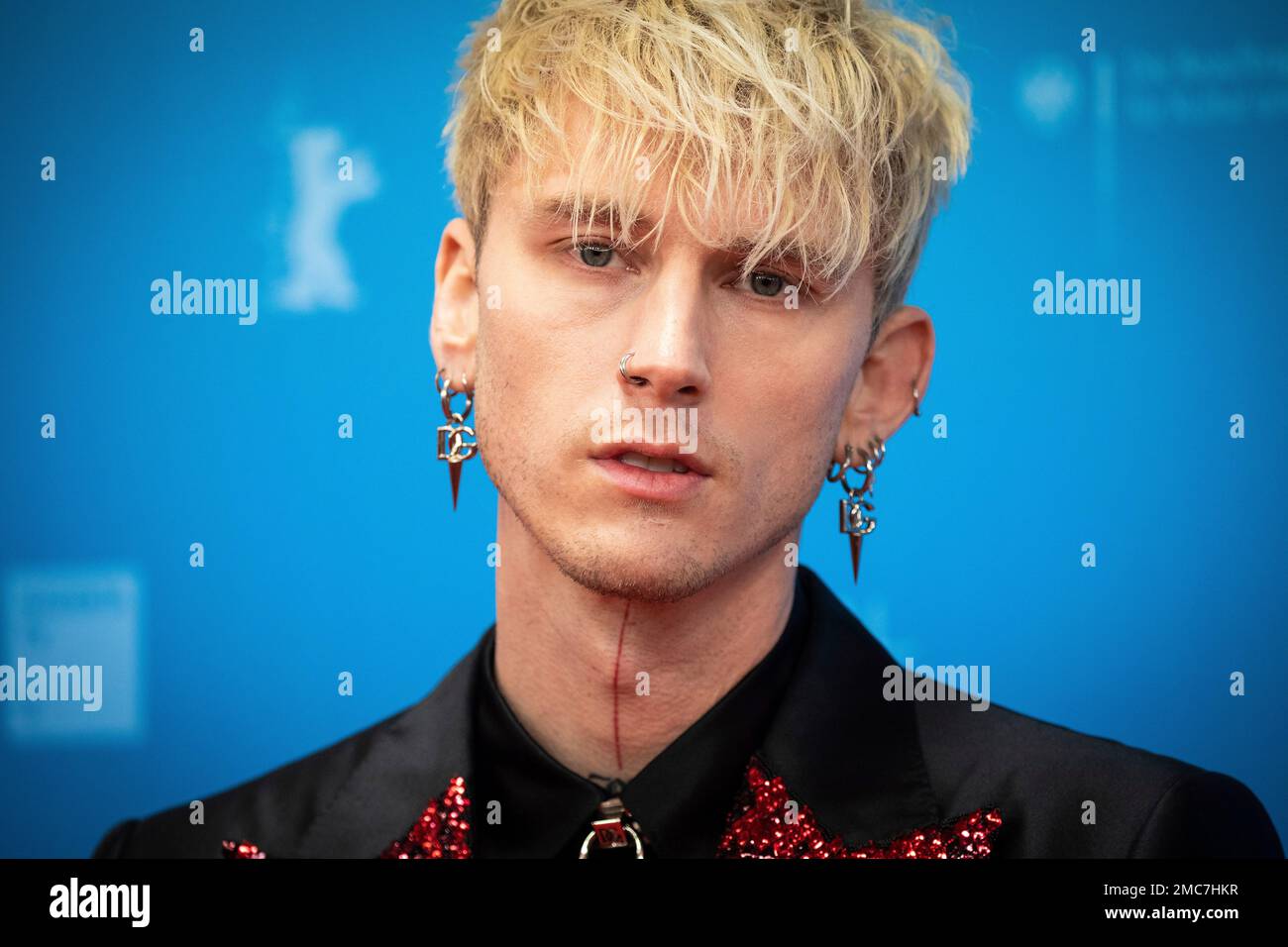 Colson Baker, also known as Machine Gun Kelly, poses for photographers ...
