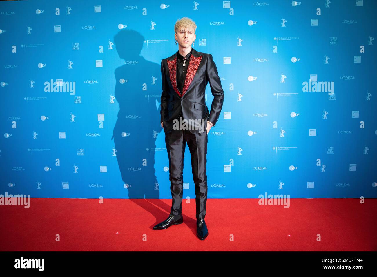 Colson Baker, also known as Machine Gun Kelly, poses for photographers ...