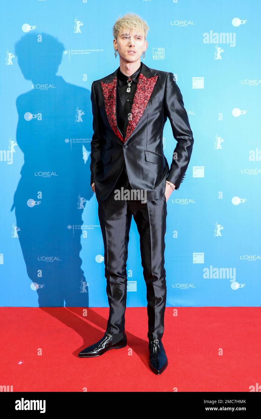 Colson Baker, also known as Machine Gun Kelly, poses for photographers ...