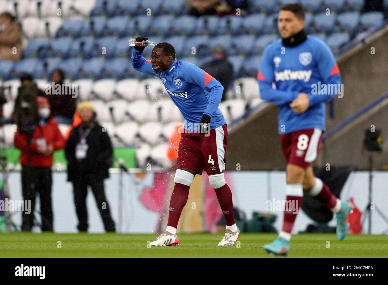 West Ham's Kurt Zouma pours water on his face during warmup before the ...