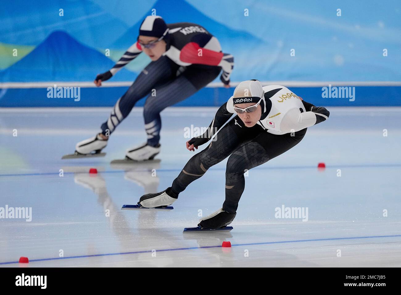 Arisa Go of Japan competes against Kim Min-sun of South Korea, behind ...