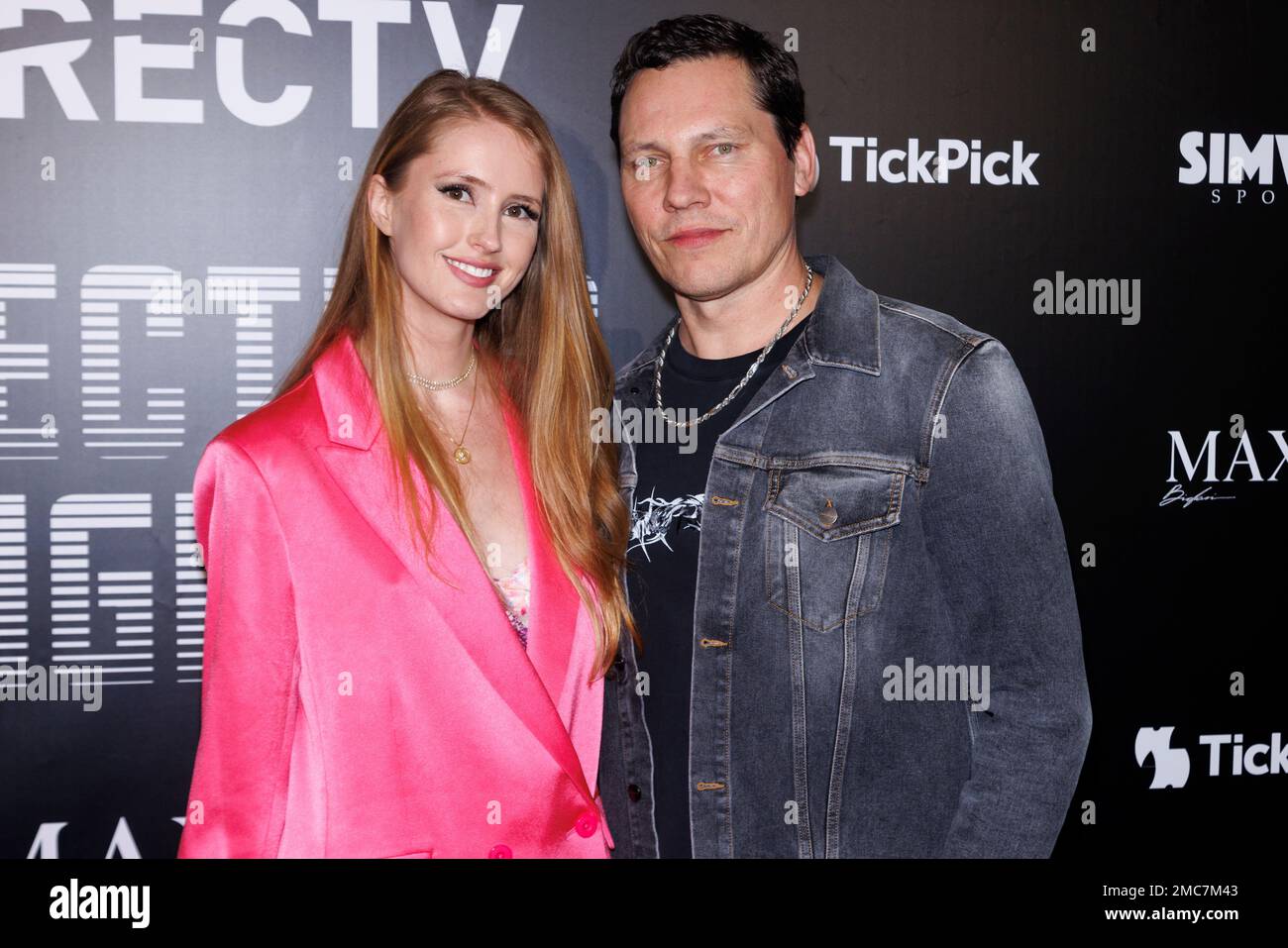 Annika Backes, left, and Tiesto attend day two of Maxim Big Game ...