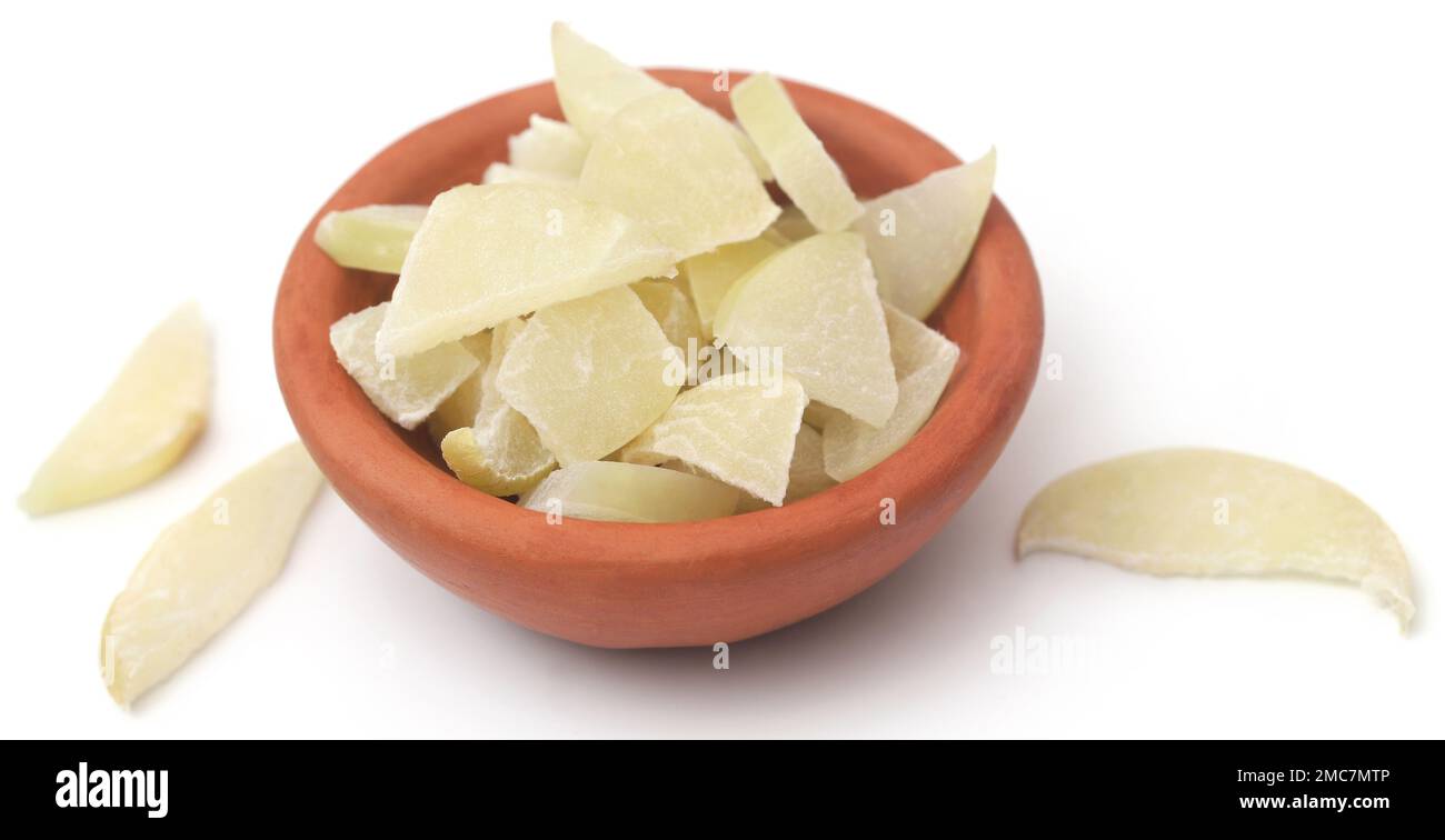 Sliced amla fruits over white background Stock Photo - Alamy