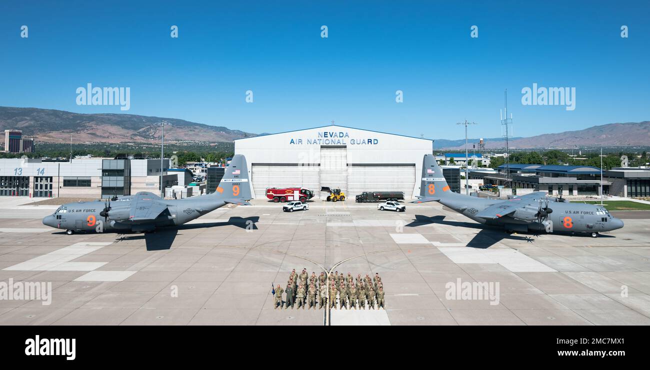 Airmen from the 152nd Airlift Wing wing staff stand in formation for a ...