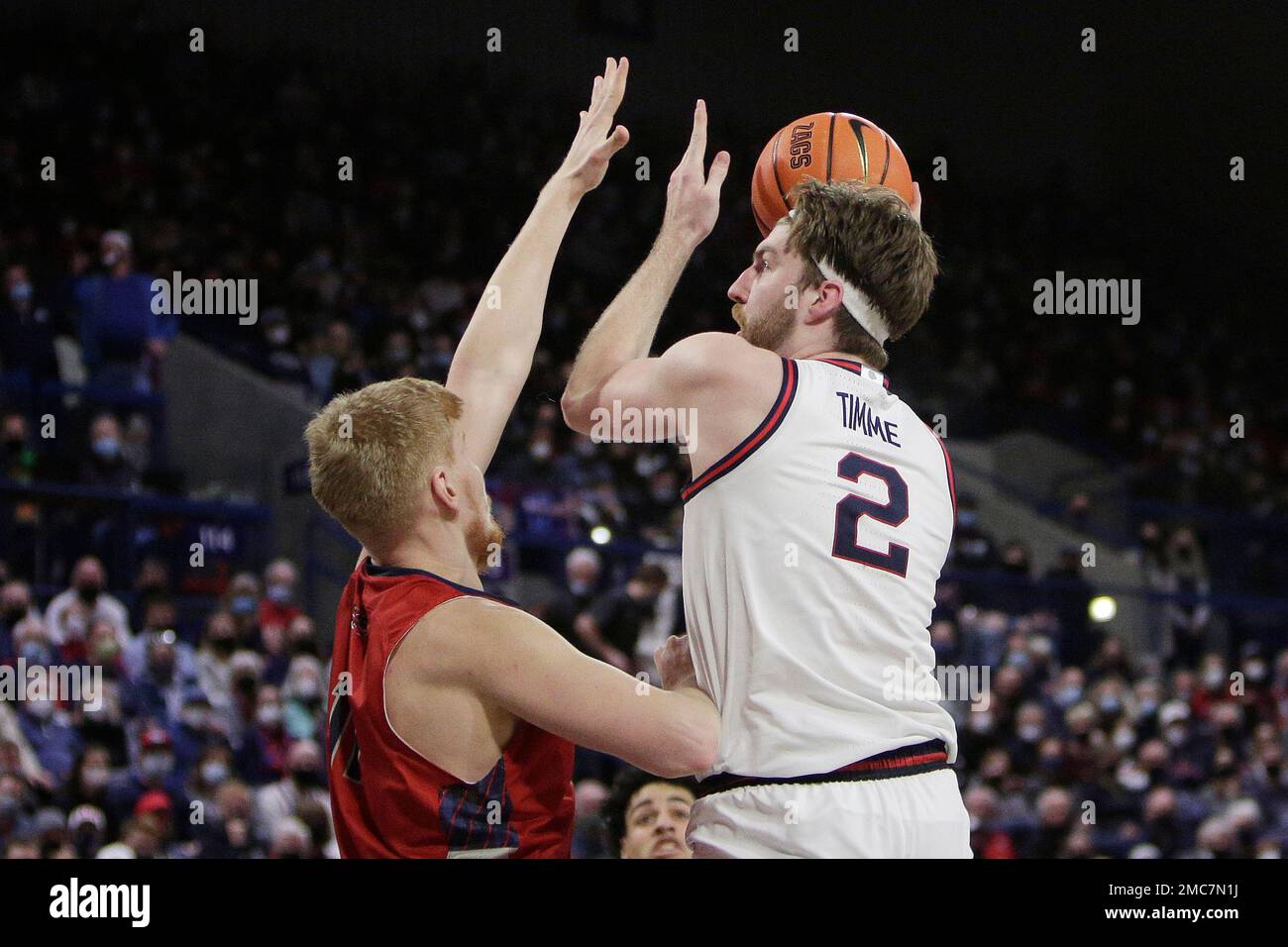 Gonzaga forward Drew Timme, right, drives to the basket as Saint Mary's ...