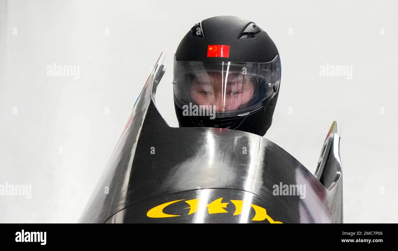 Ying Qing, of China, drives during the women's monobob heat 1 at the ...