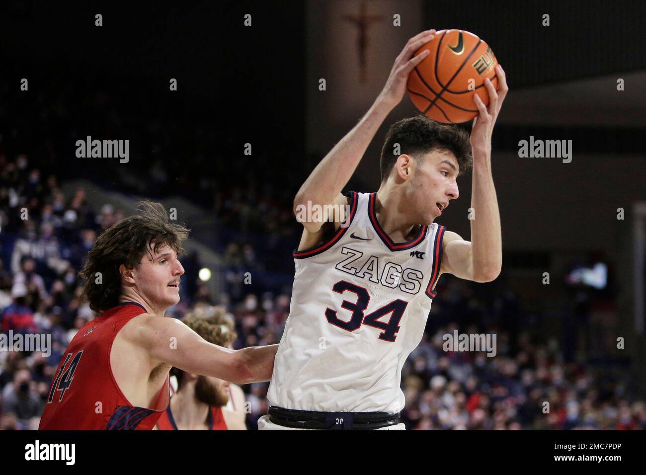 Gonzaga center Chet Holmgren, right, grabs a rebound next to Saint Mary ...