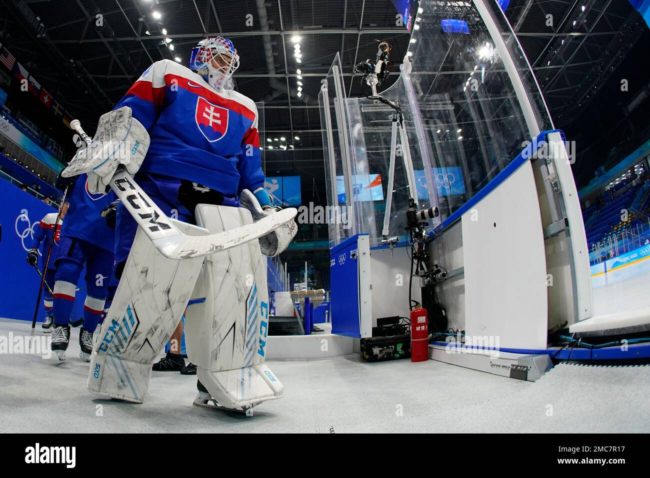 Slovakia goalkeeper Patrik Rybar enters the rink for a preliminary ...