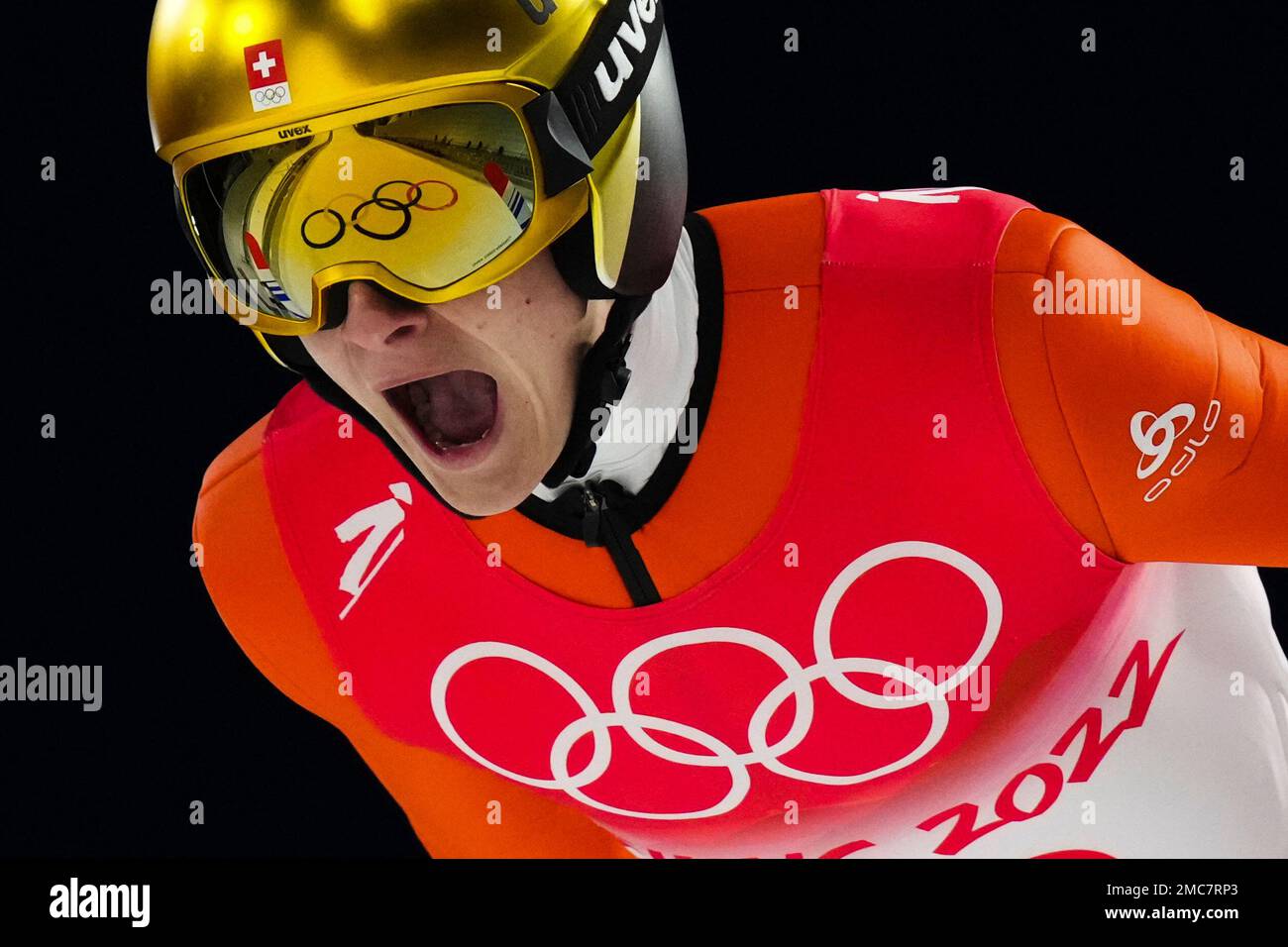 Dominik Peter, of Switzerland, soars through the air during a men's ...