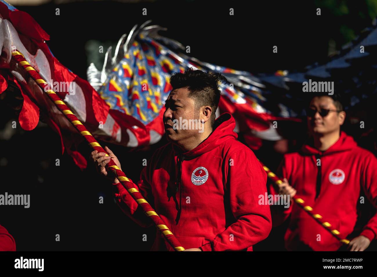 Barcelona, Spain. 21st Jan, 2023. Actors perform the dragon dance to ...