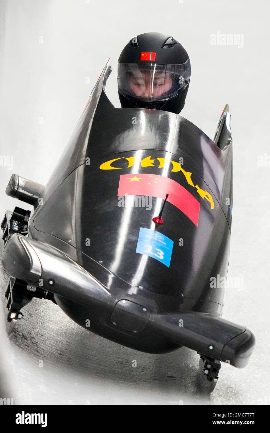 Ying Qing, of China, drives during the women's monobob heat 1 at the ...