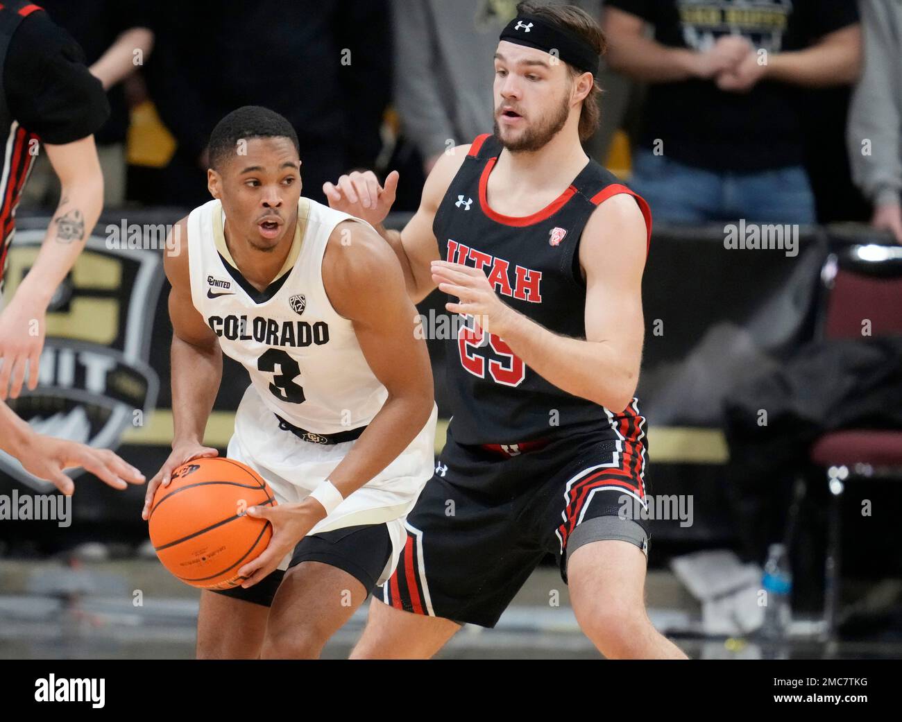 Colorado guard Keeshawn Barthelemy, left, looks to pass the ball as ...