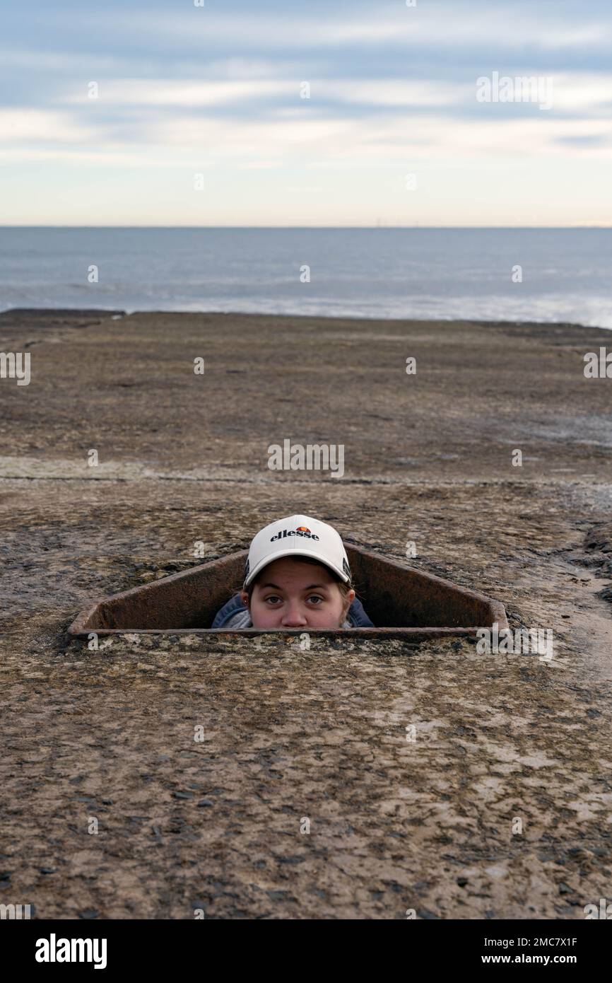 Concrete blocks and drainage channel on the Northumberland coast, UK ...