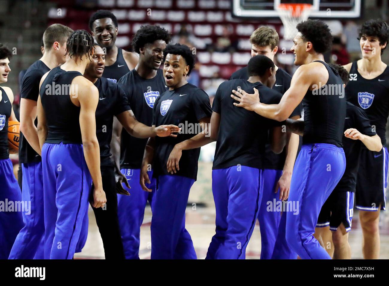 Duke players warm up before an NCAA college basketball game against ...