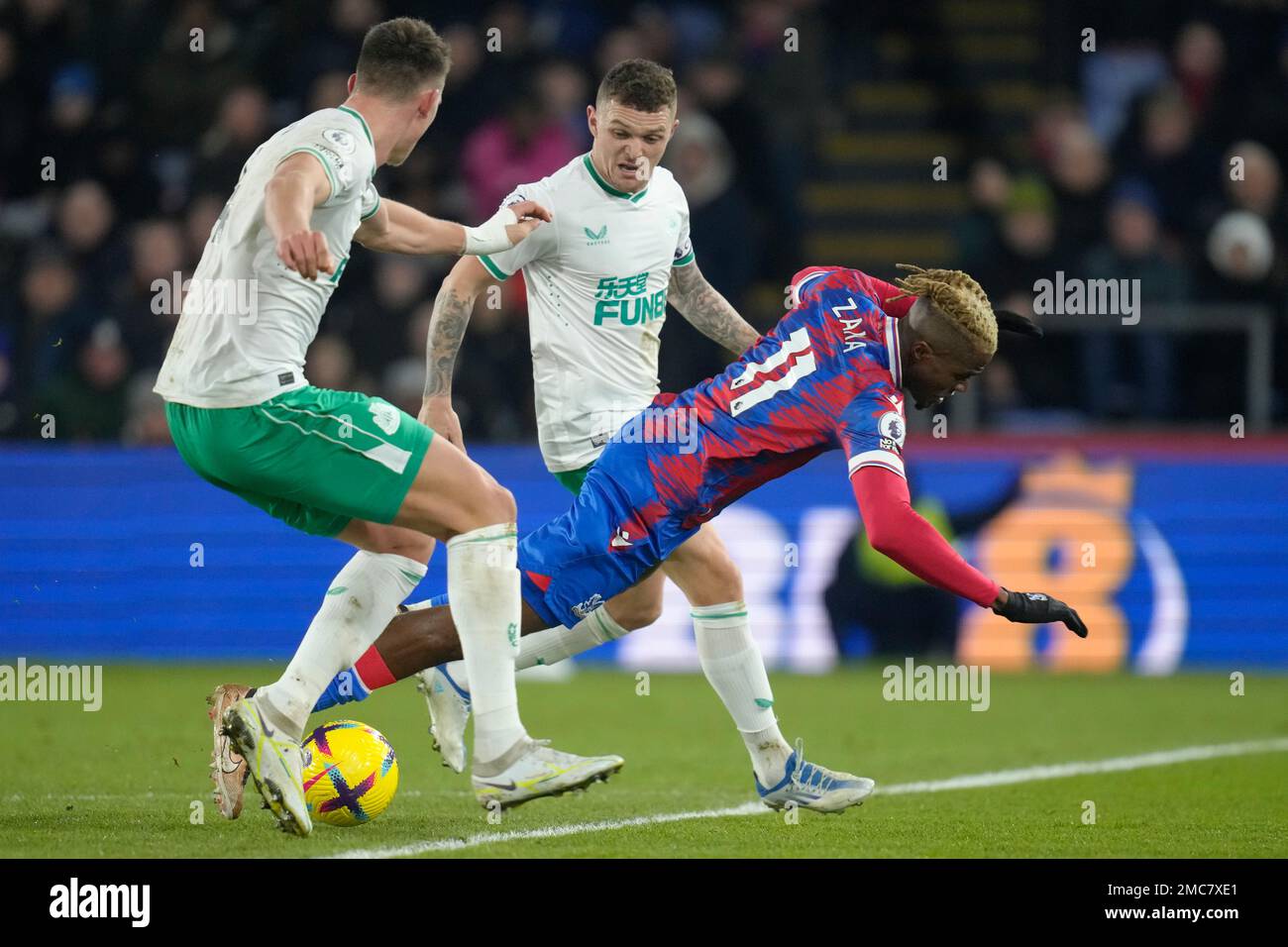 Crystal Palace's Wilfried Zaha falls during the English Premier League ...