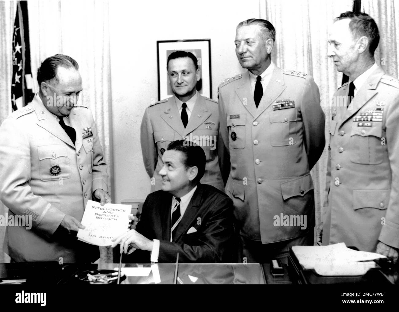 Army Chief of Staff General G.H. Decker hands Secretary of the Army ...