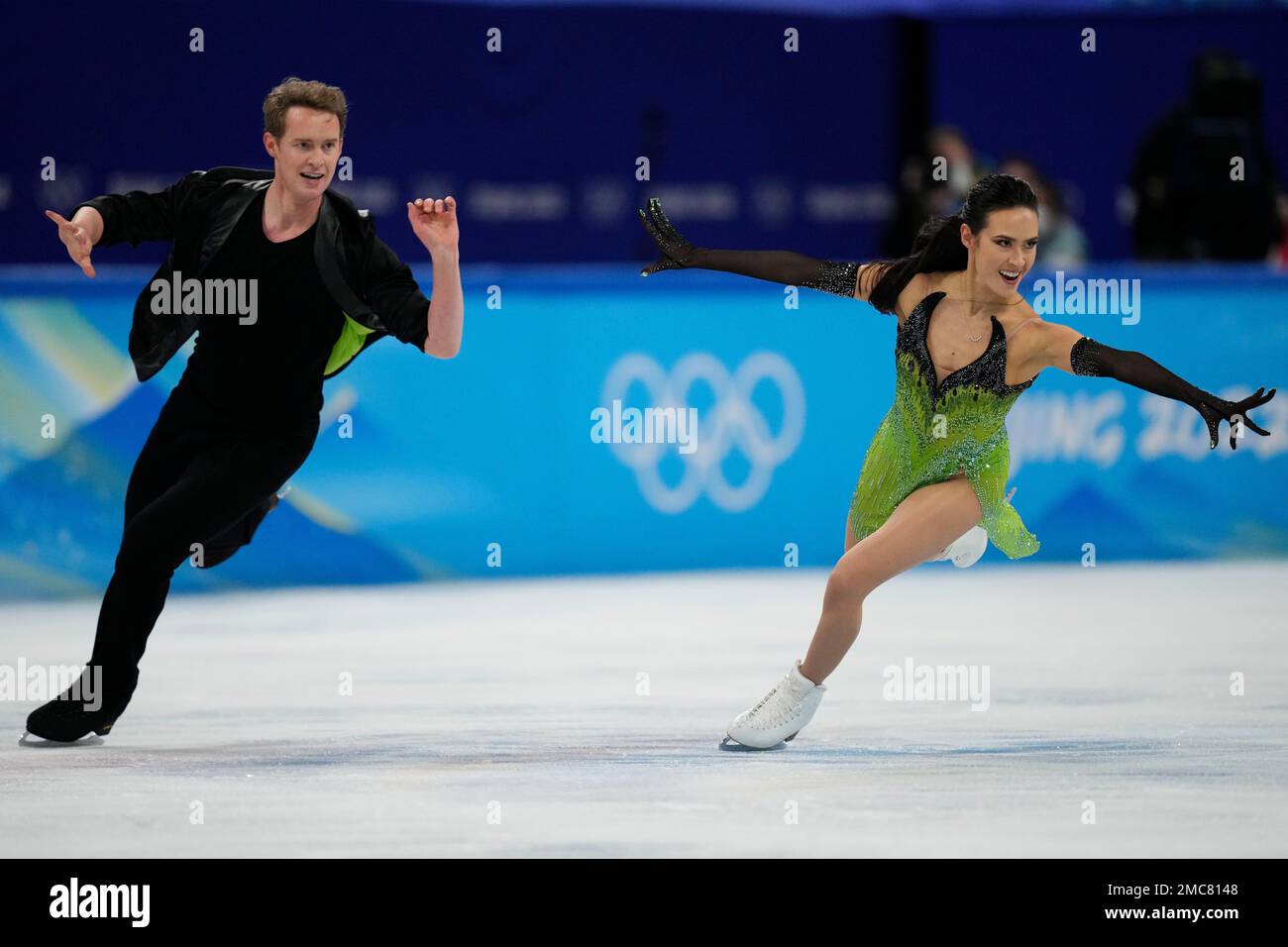 Madison Chock and Evan Bates, of the United States, perform their ...