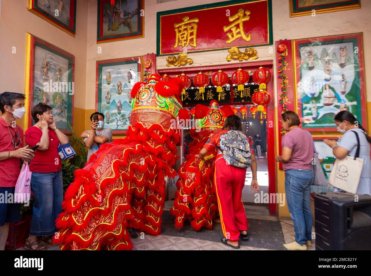 Dancers perform Lions dance during the Chinese Lunar New Year at Guan ...