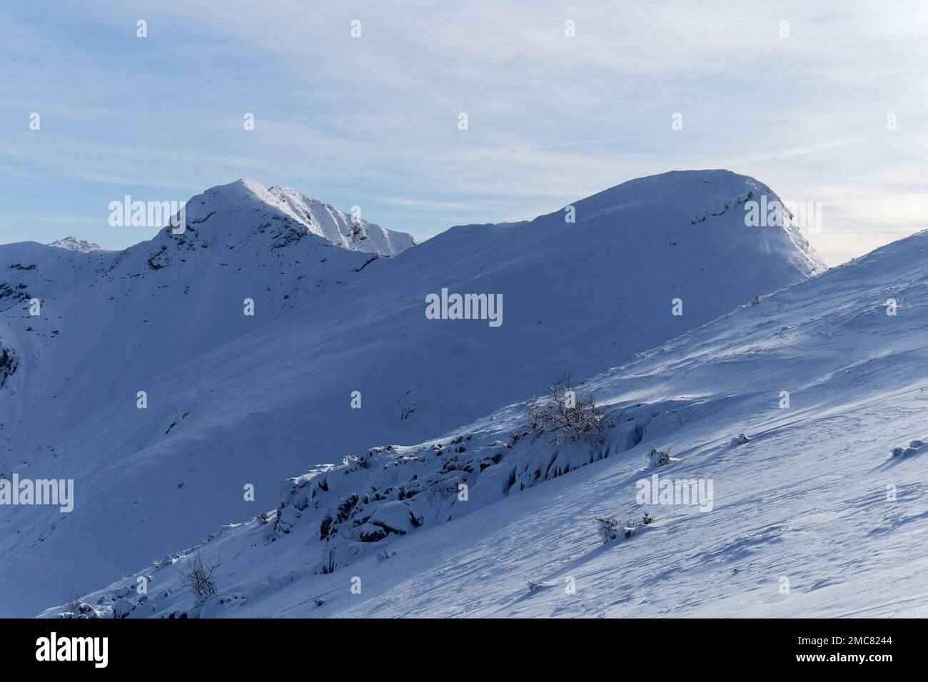 Amazing view of different mountain peaks with snow during winter ...