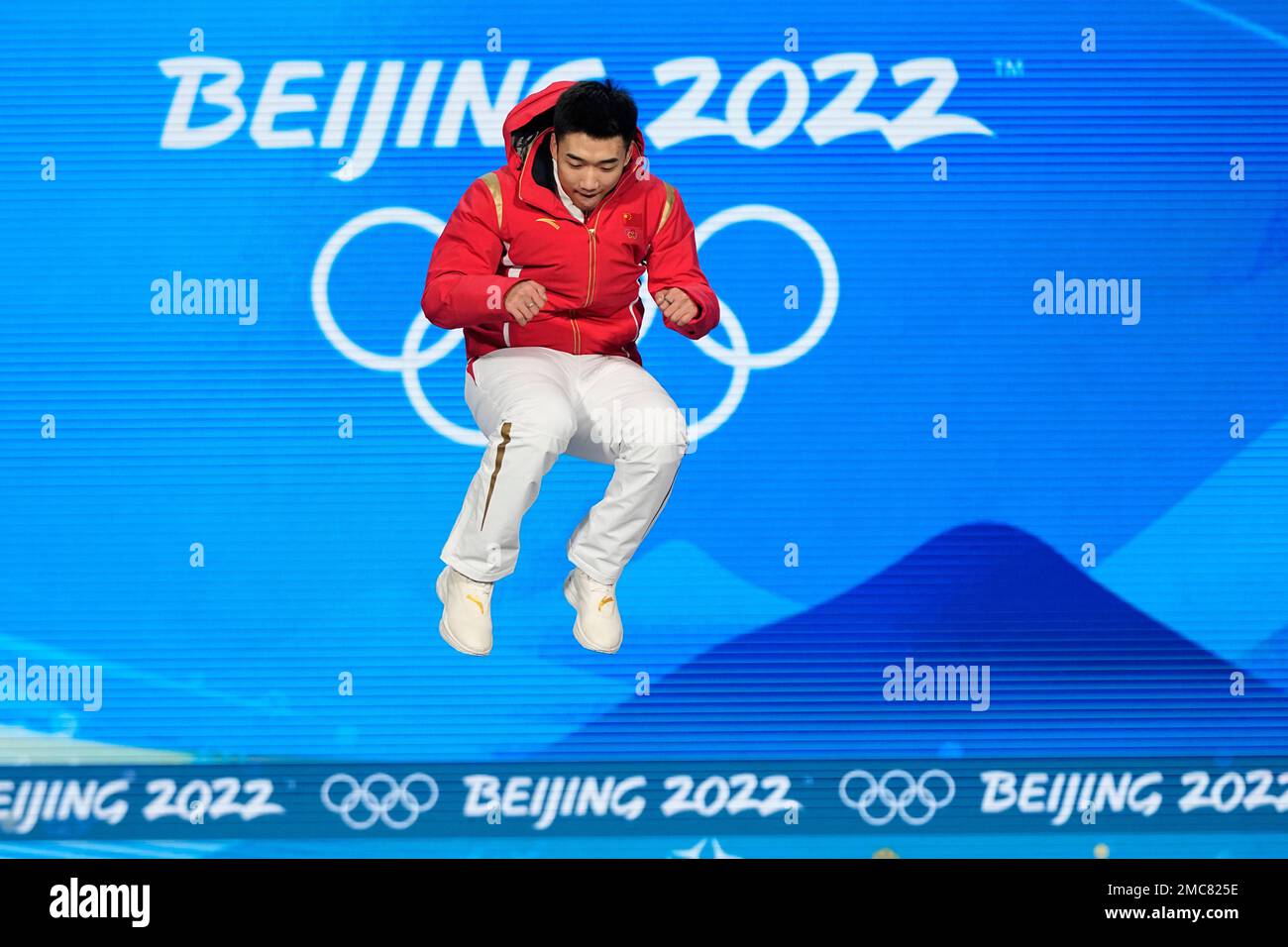 Gold medalist Gao Tingyu of China celebrates during the medal ceremony ...