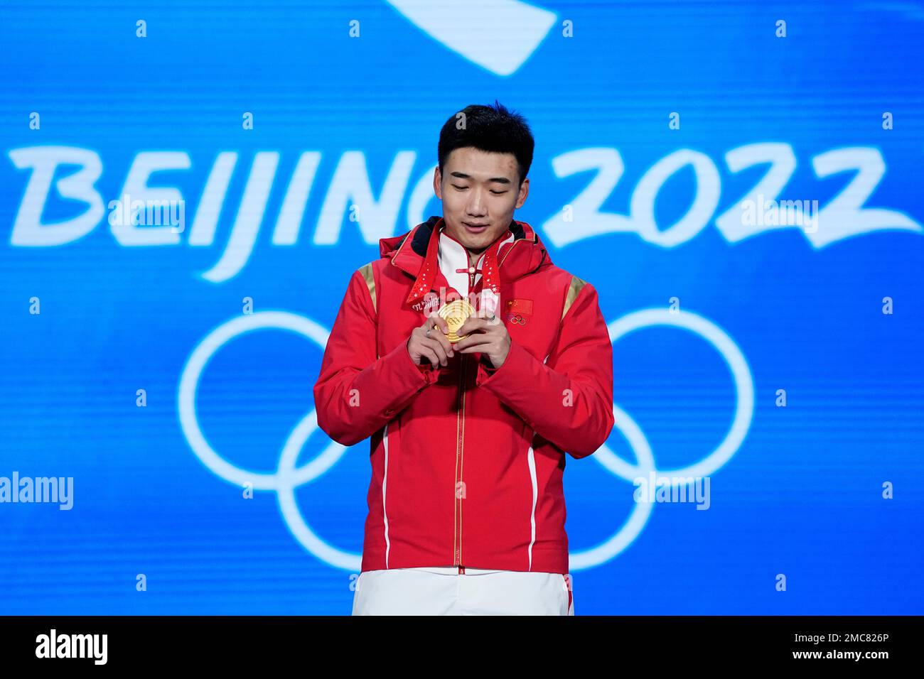 Gold medalist Gao Tingyu of China celebrates during the medal ceremony ...