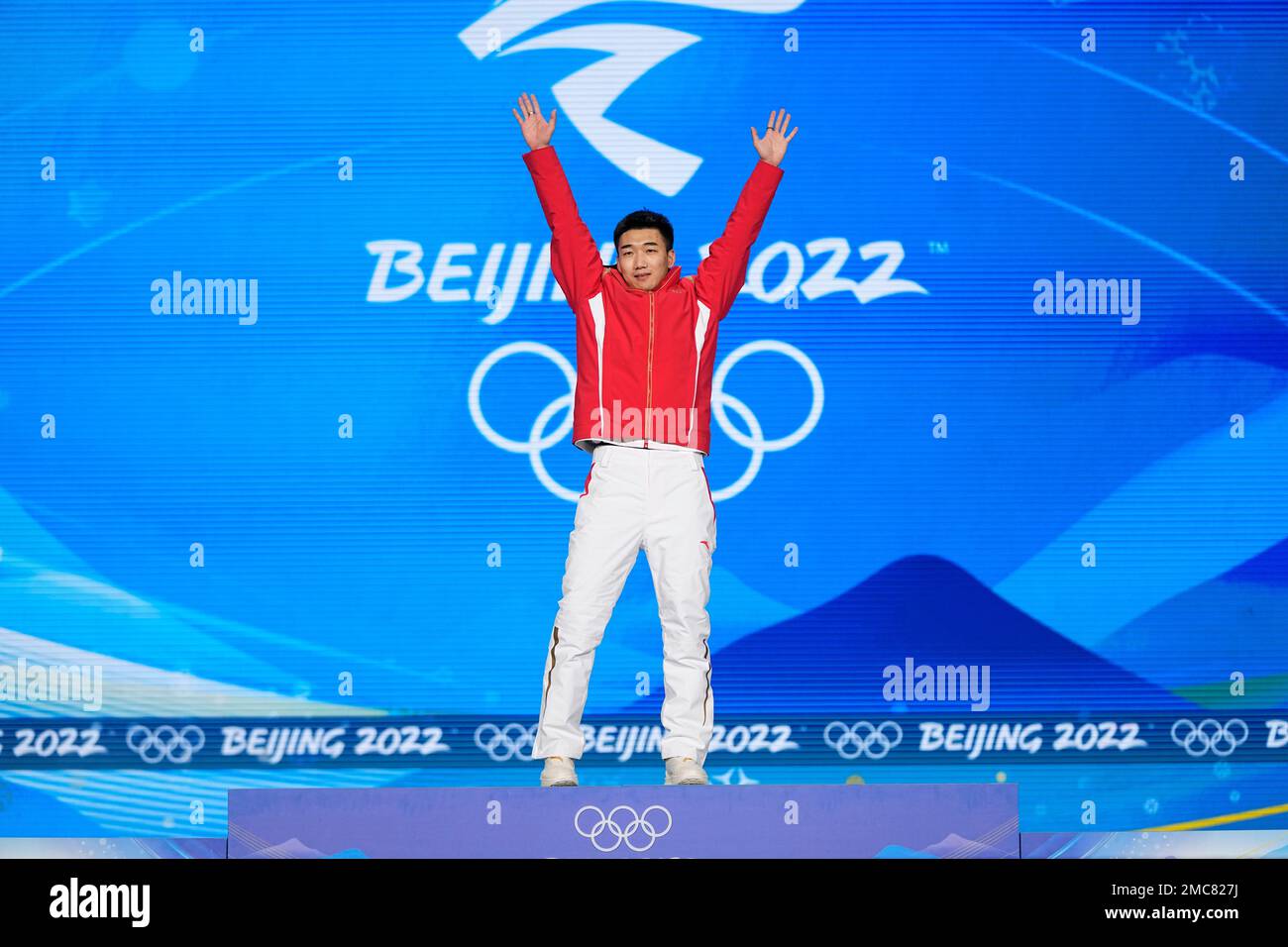 Gold medalist Gao Tingyu of China celebrates during the medal ceremony ...