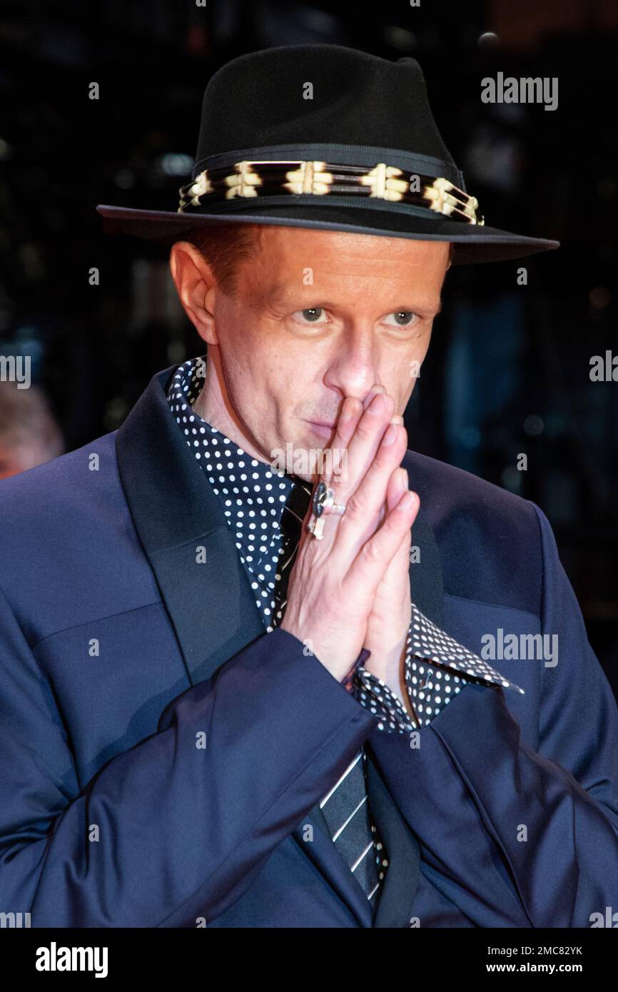 Alexander Scheer poses for photographers during the opening red carpet ...