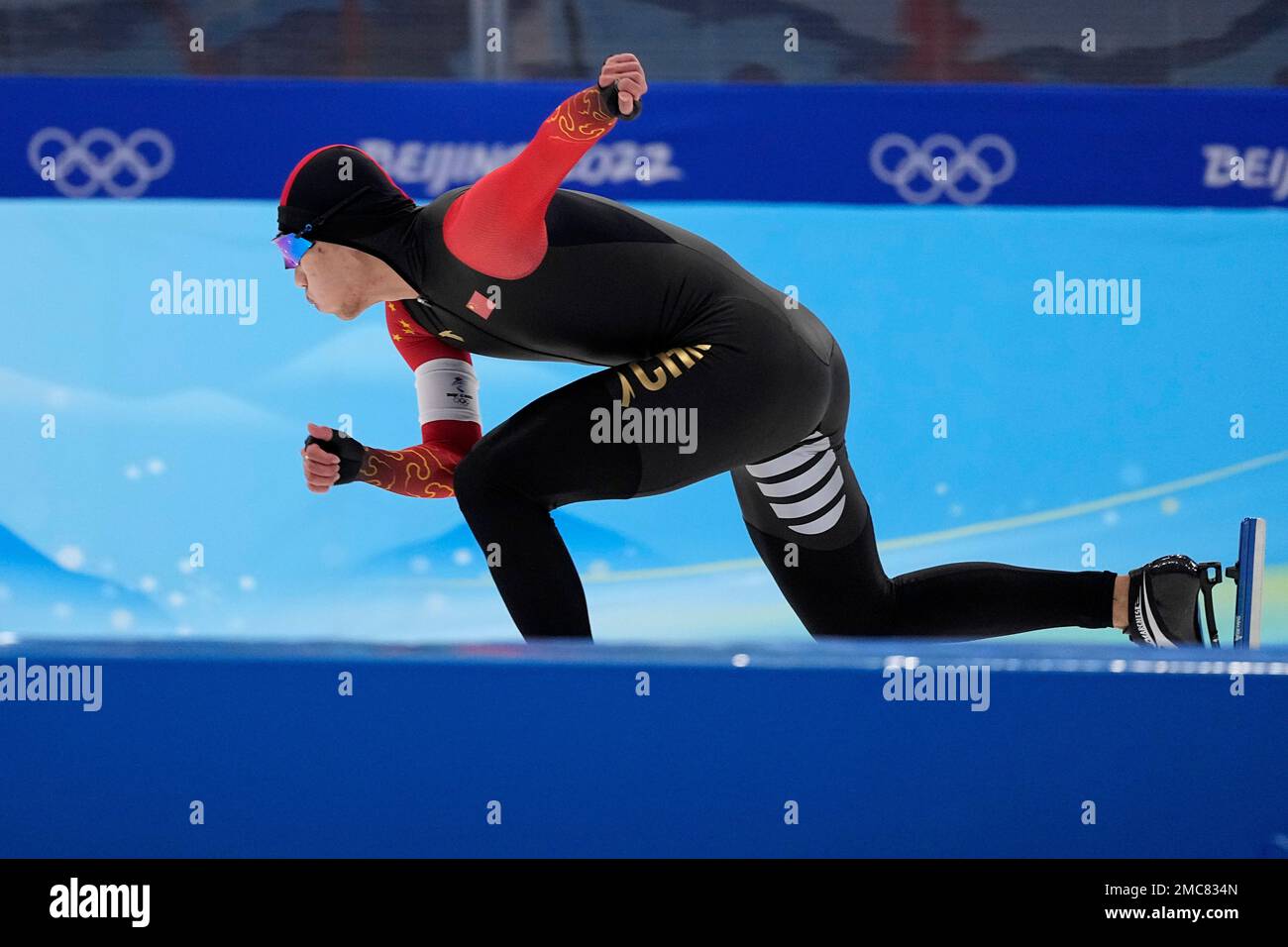Gao Tingyu of China competes in the men's speedskating 500-meter race ...