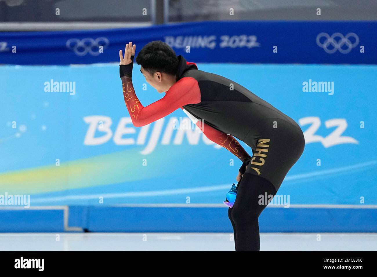 Gao Tingyu of China reacts after setting an Olympic record in his heat ...
