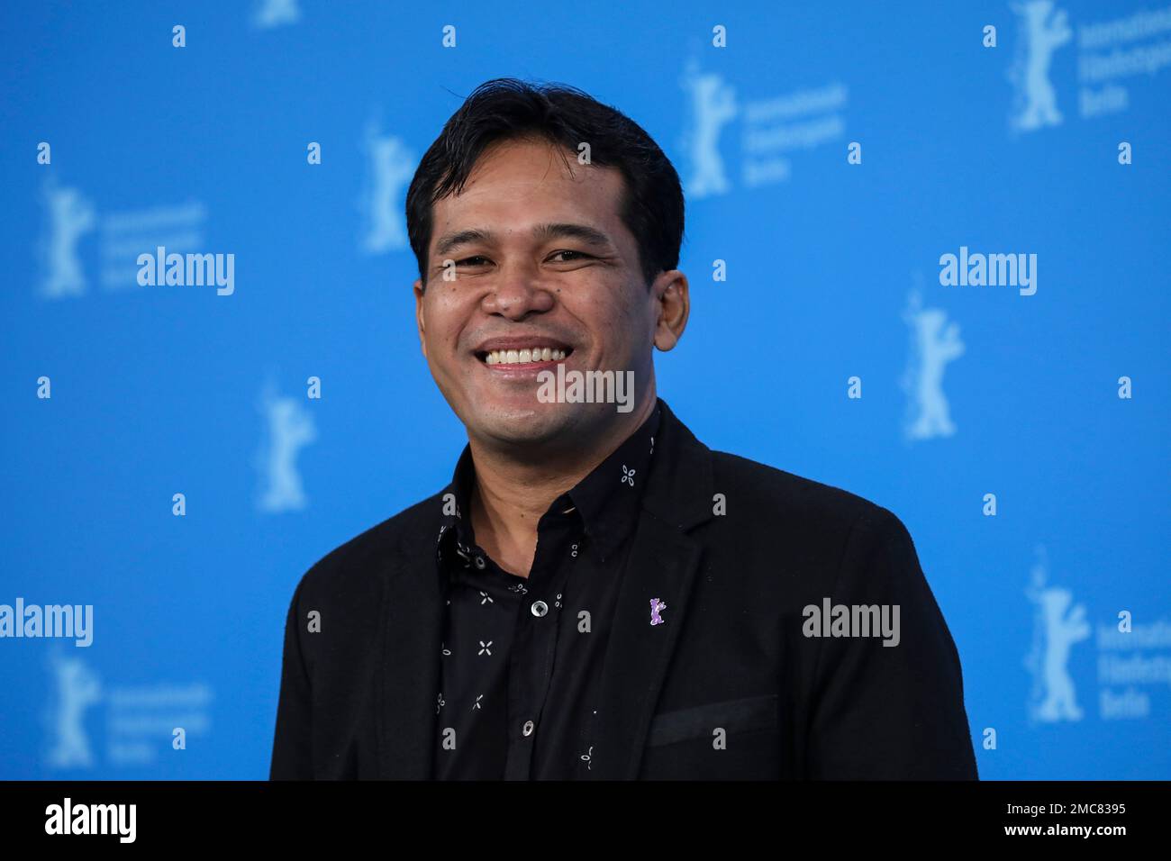 Ifa Isfansyah poses for photographers at the photo call for the film ...