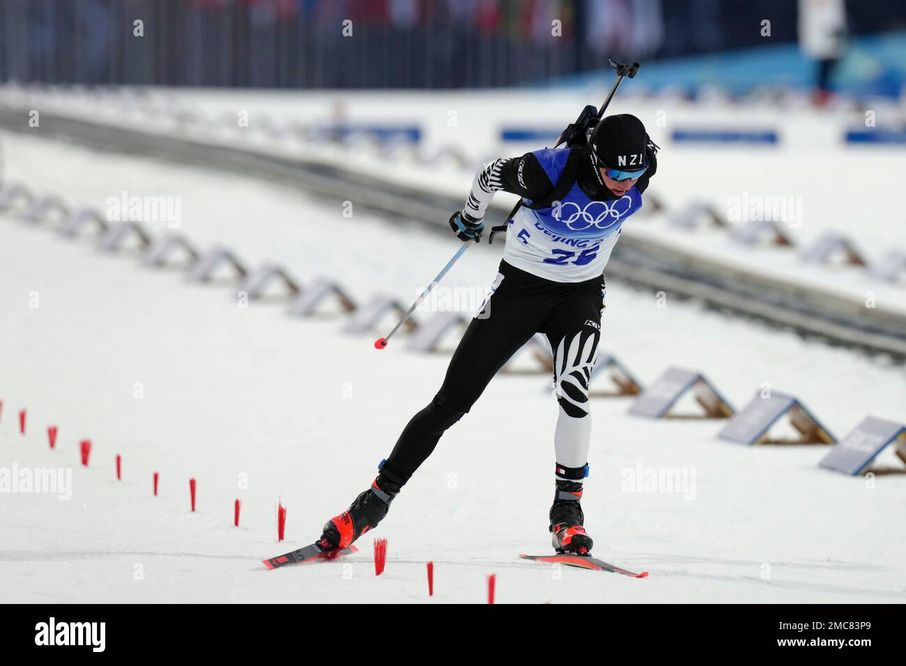 Campbell Wright of New Zealand crosses the finish line during the men's ...