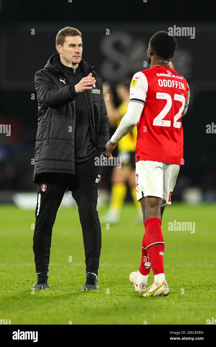 Rotherham United manager Matt Taylor (left) on the pitch with Rotherham ...