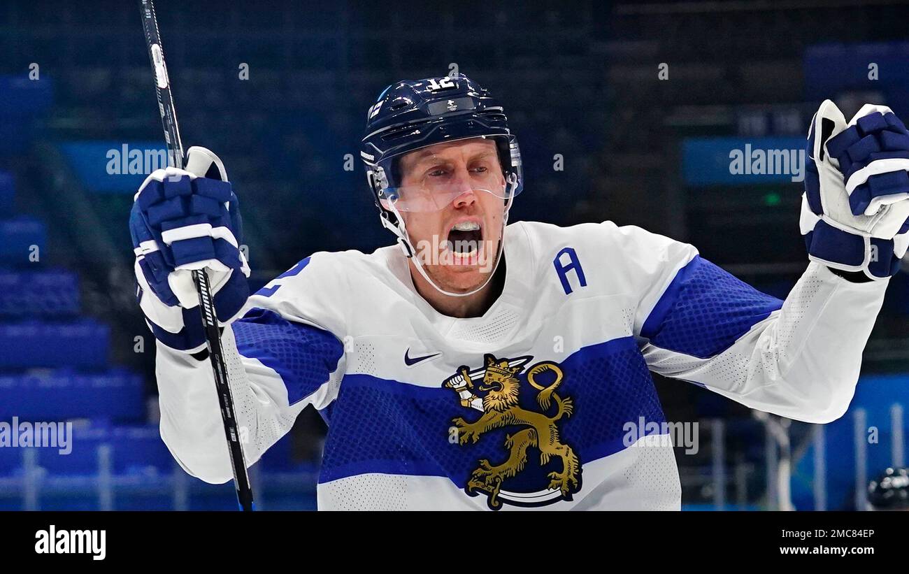 Finland's Marko Anttila, left, celebrates after scoring a goal against ...