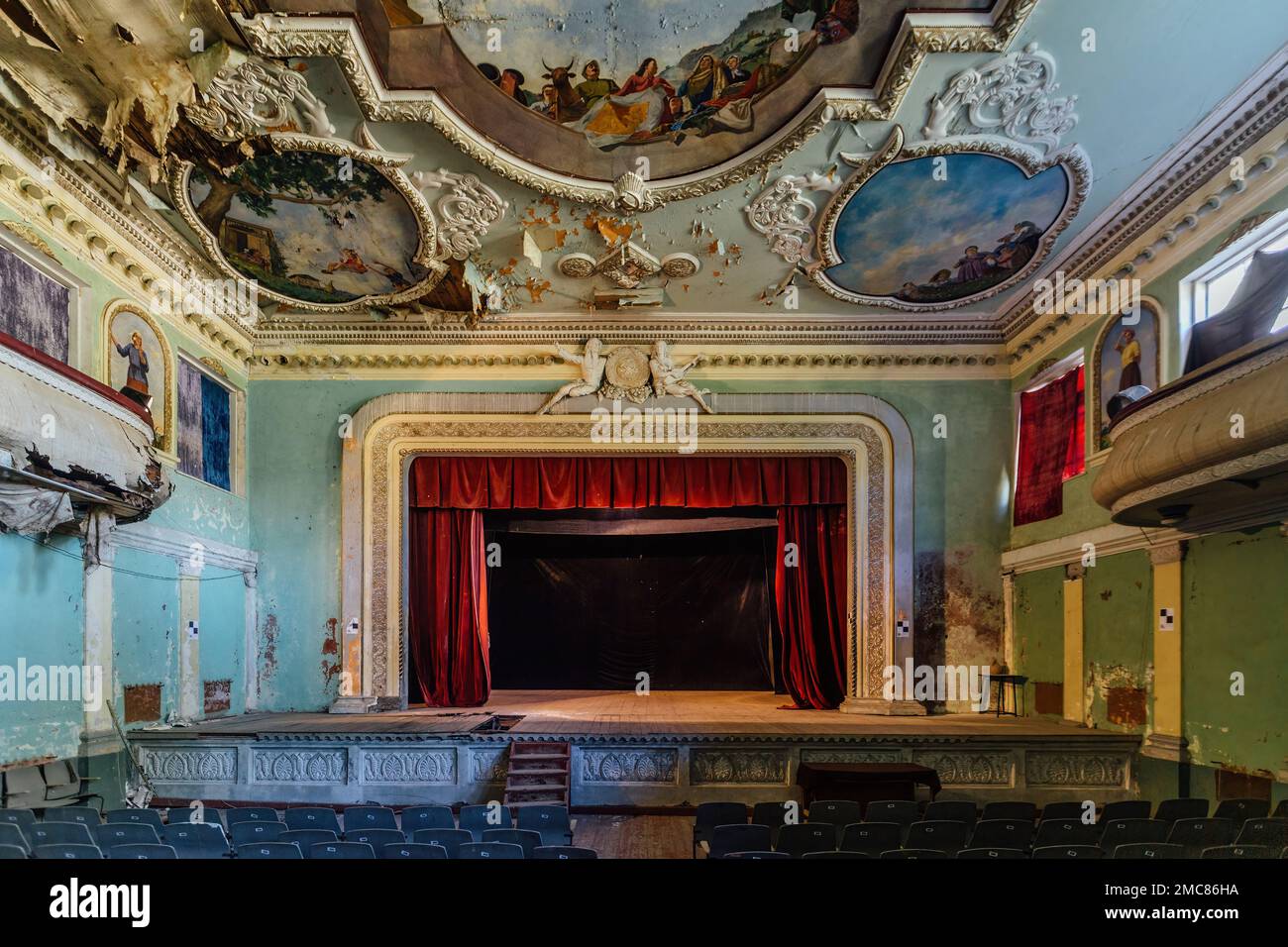 Old abandoned ruined stage theater with paintings Stock Photo - Alamy