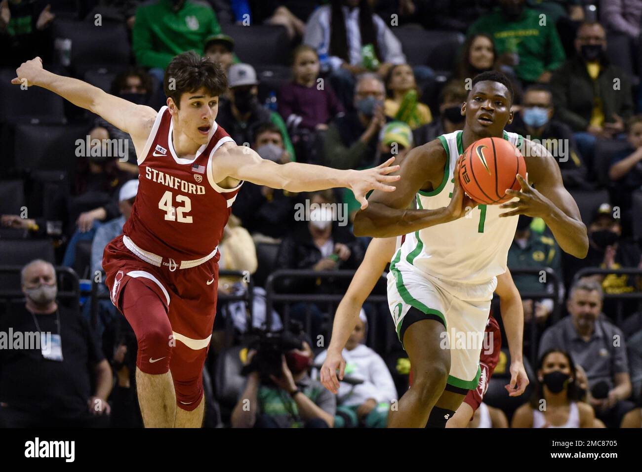Stanford forward Maxime Raynaud (42) tries to get a hand on the ball as ...