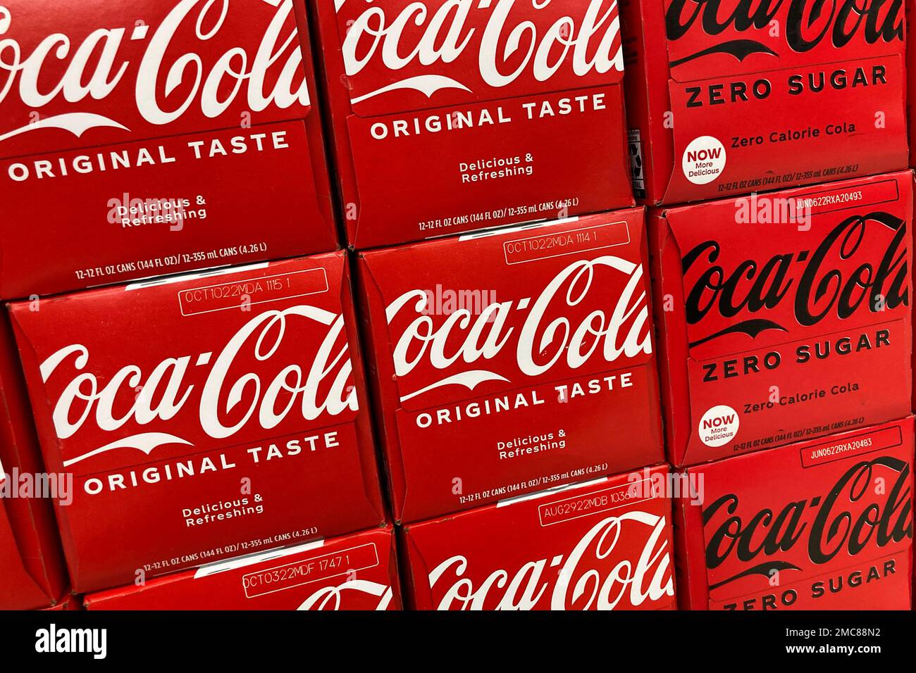 Boxes of Coca-Cola are displayed in a grocery store, Ill., Thursday ...