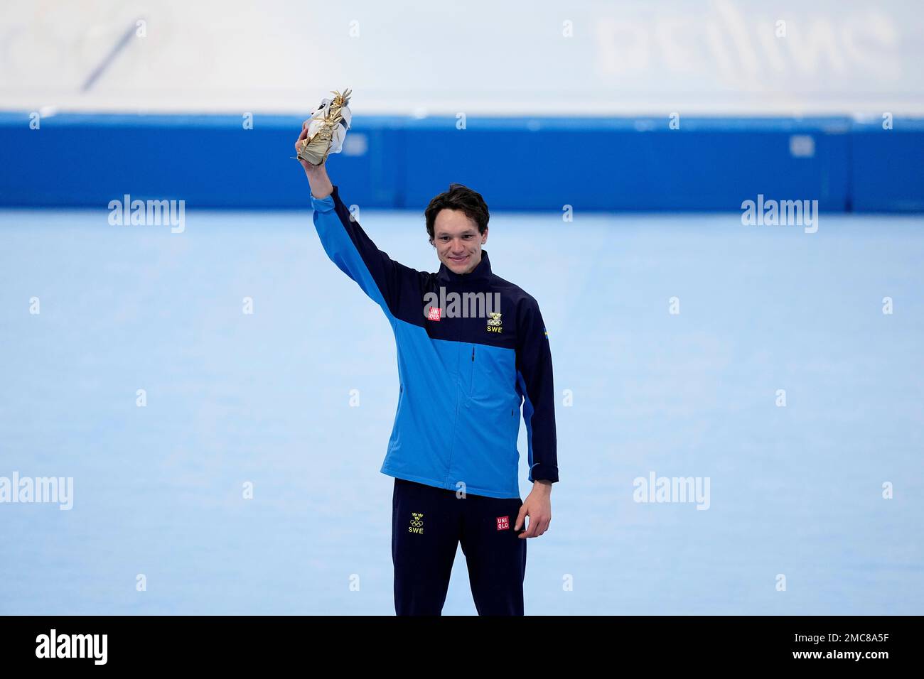 competes in the men's speedskating 10,000-meter race at the 2022 Winter ...